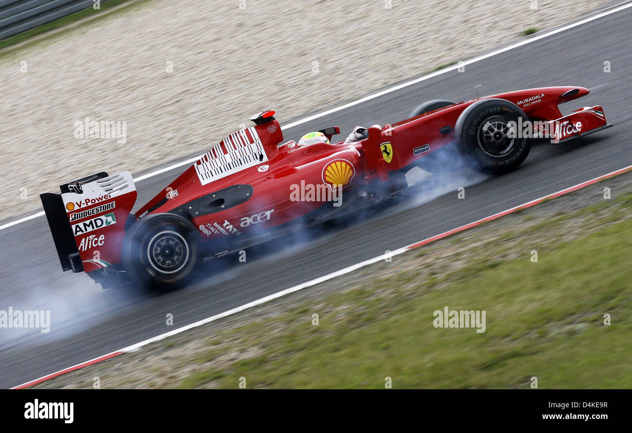 Brazilian Formula One driver Felipe Massa of Scuderia Ferrari steers ...