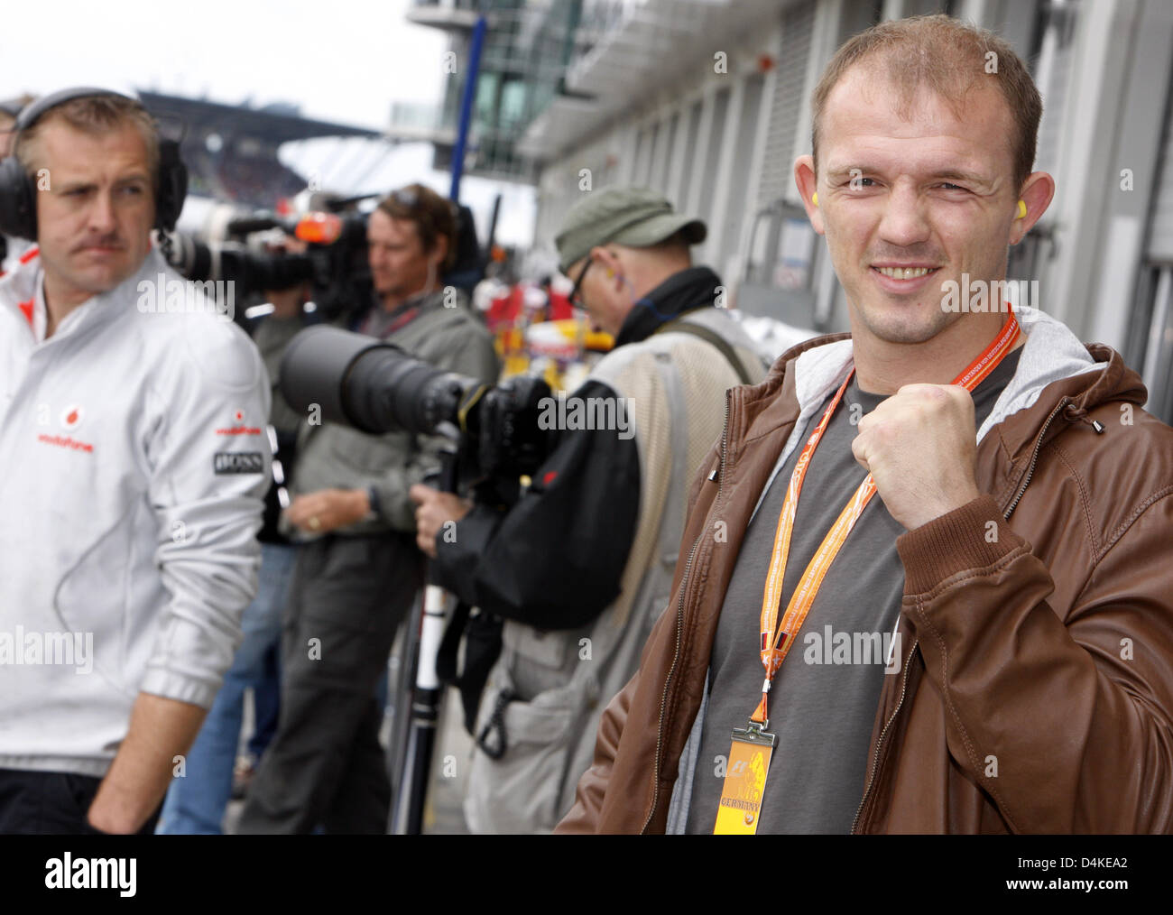 German cruiserweight boxer Juergen Braehmer gestures in the pit lane ...