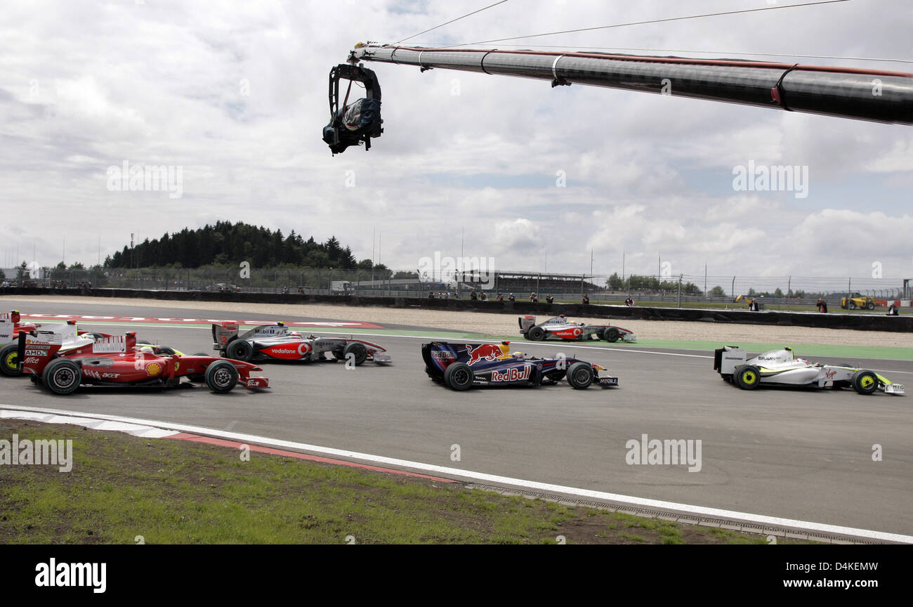 Brazilian Formula One driver Rubens Barrichello of Brawn GP (R) leads ...