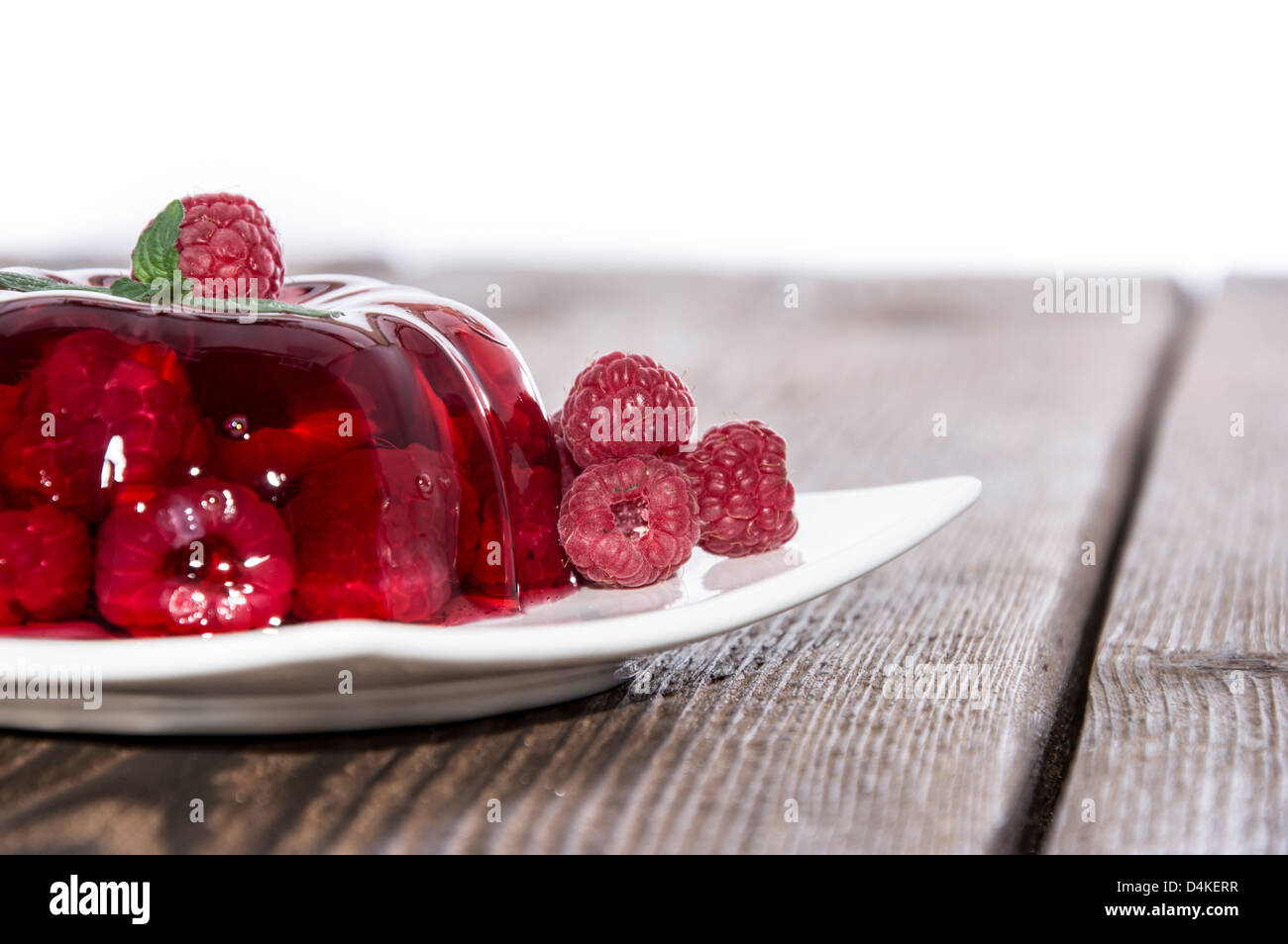 Raspberry Jello isolated on white background Stock Photo - Alamy