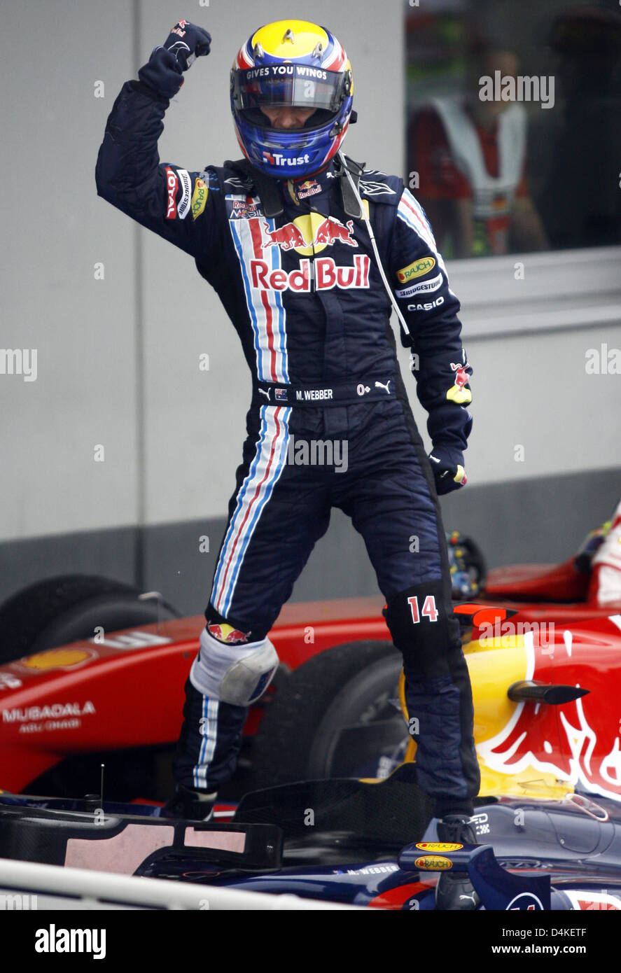 Australian Formula One driver Mark Webber of Red Bull Racing celebrates ...
