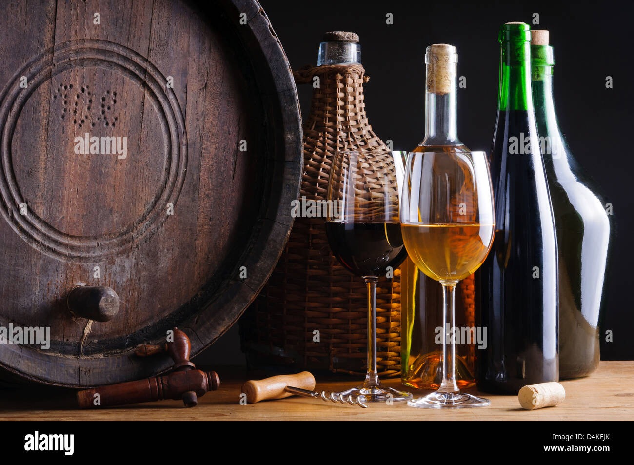 Wine tasting in cellar with bottles, glass and barrel Stock Photo - Alamy