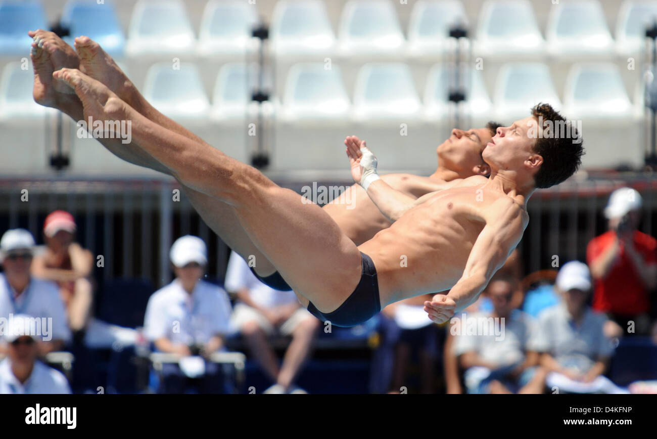 Germany?s Patrick Hausding (front) and Stephan Feck dive off the 3m ...