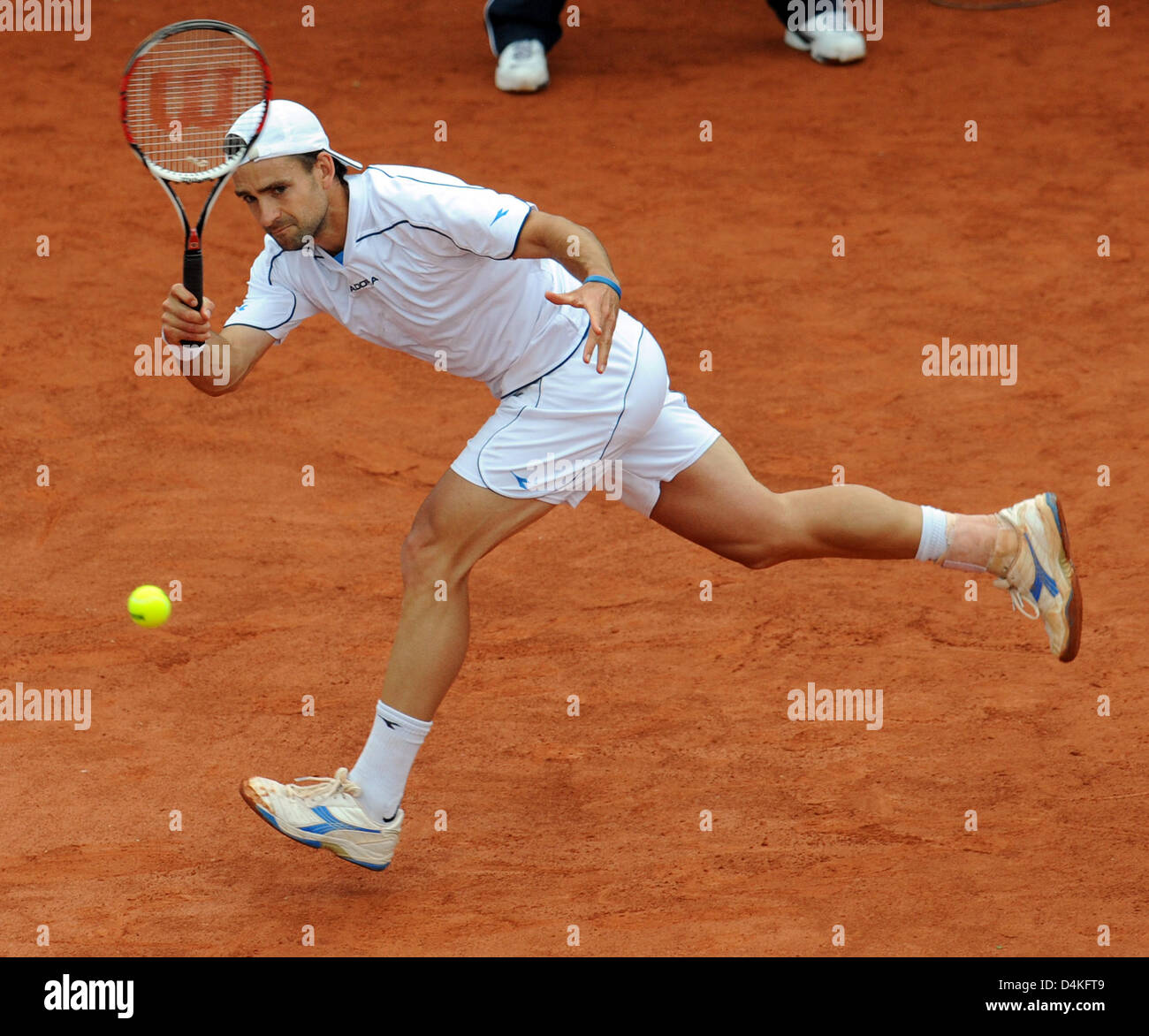 Germany?s Nicolas Kiefer returns a forehand to France?s Jeremy Chardy ...