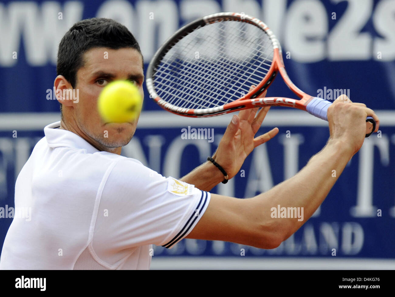 Romania?s Victor Hanescu returns a backhand to France?s Jeremy Chardy ...