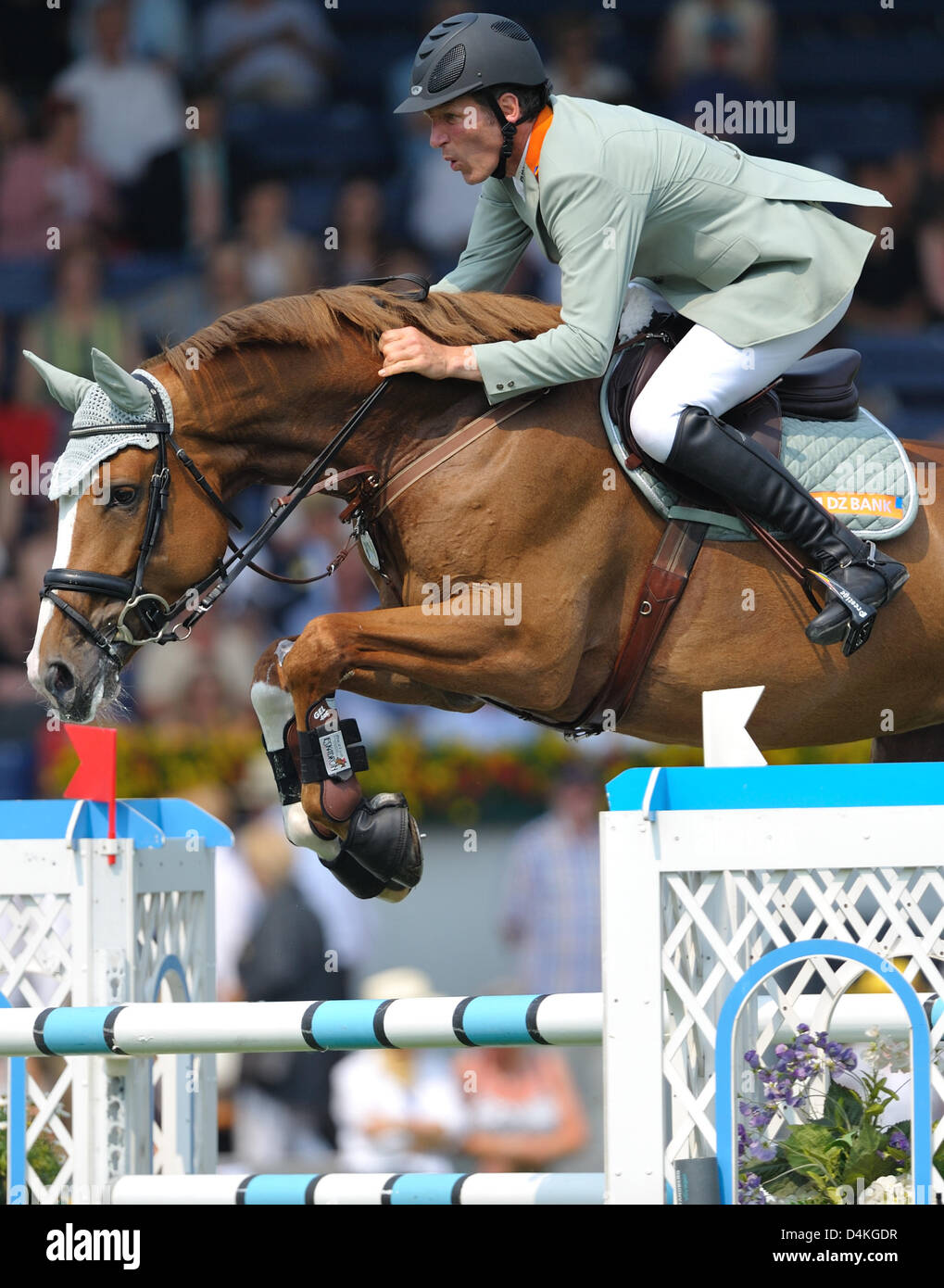 Ludger Beerbaum from Germany and his horse Gotha clear an obstacle ...