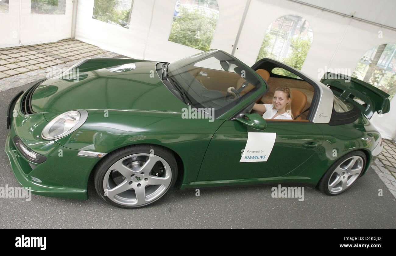 Andrea present an electro-powered Porsche eRUF Greenster in Nuermberg ...