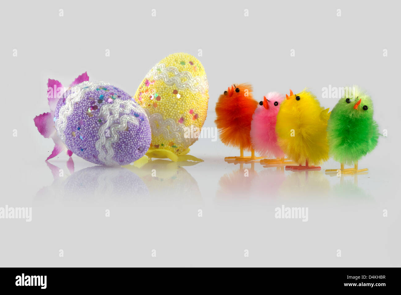 Four colour Easter chick and two eggs decorated in a light grey ...