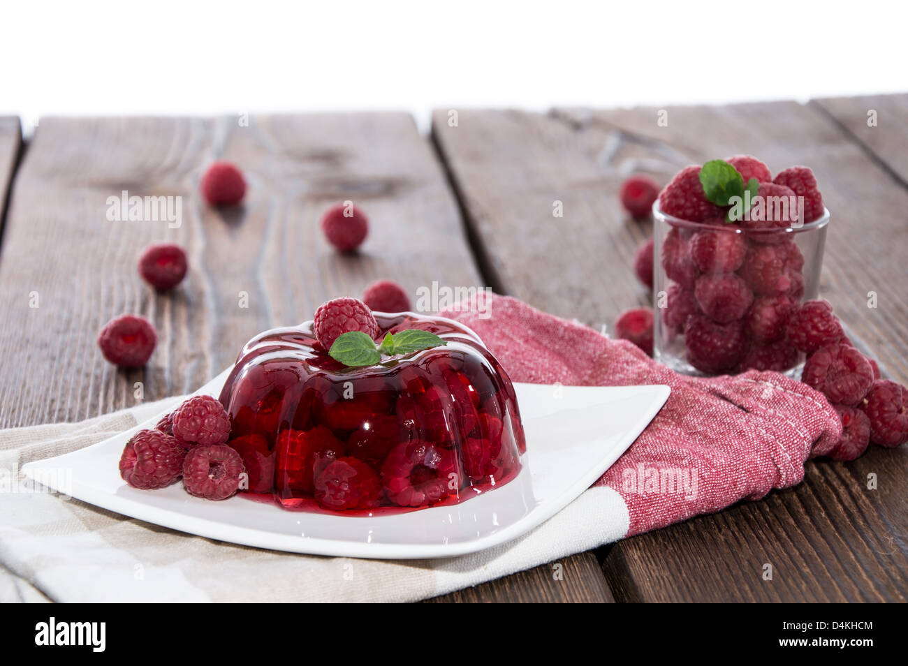 Raspberry Jello isolated on white background Stock Photo - Alamy