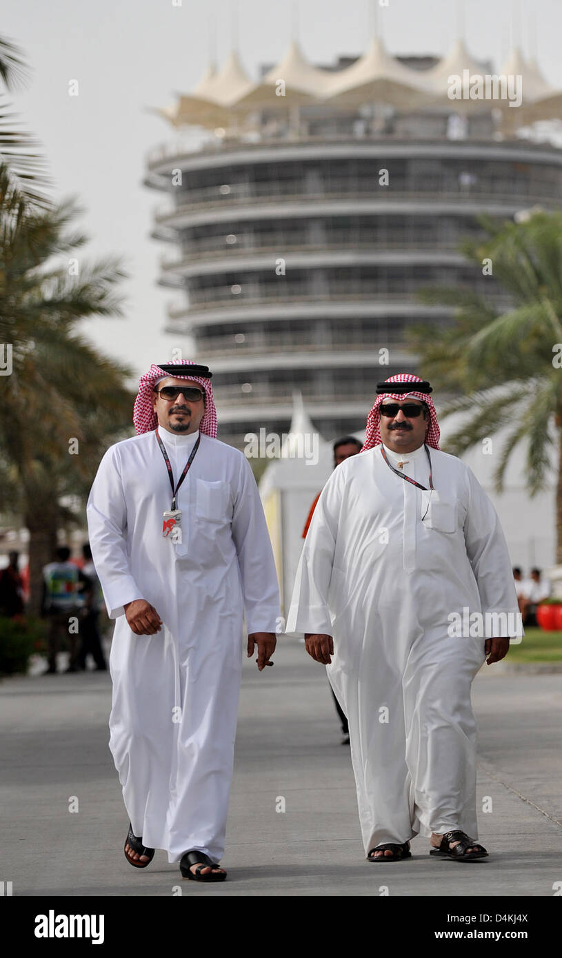Crown Prince of Bahrain Sheikh Salman bin Hamad Al Khalifa (L) and head ...