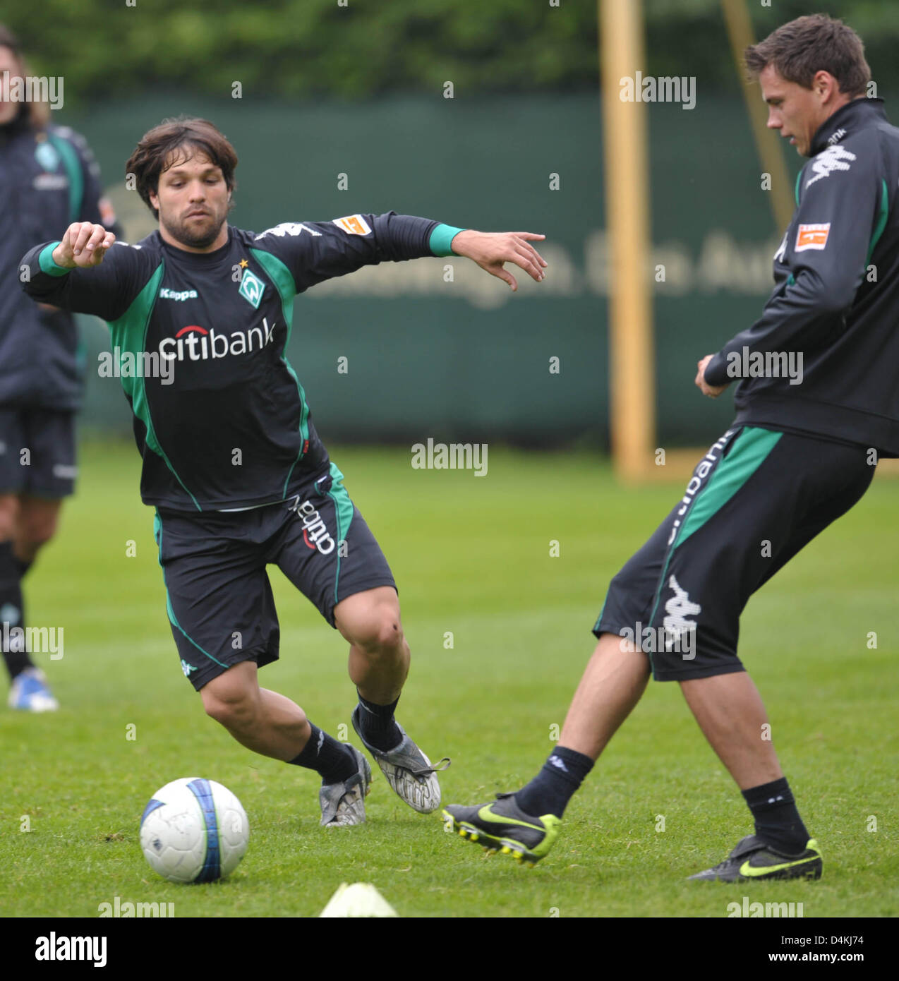 Bremen?s Diego (L) and his teammate Sebastian Boenisch are pictured ...