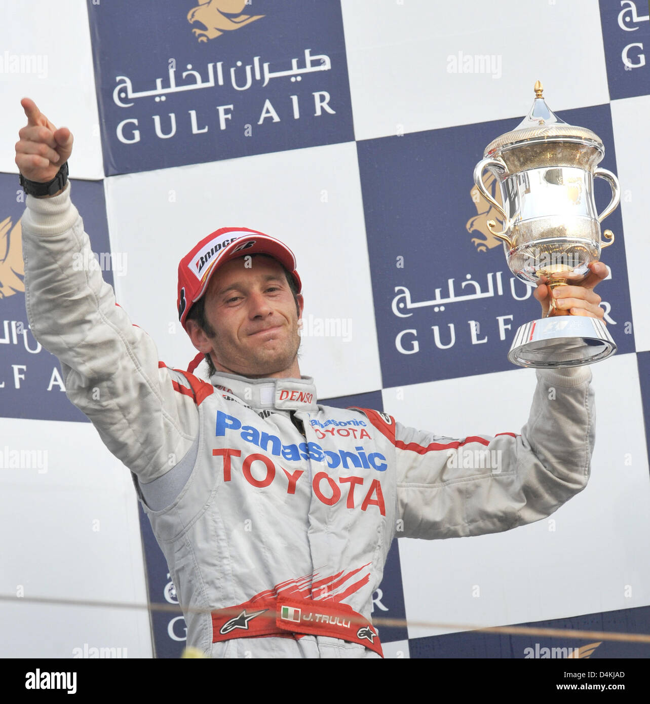 Italian Formula One driver Jarno Trulli of Toyota celebrates his third ...