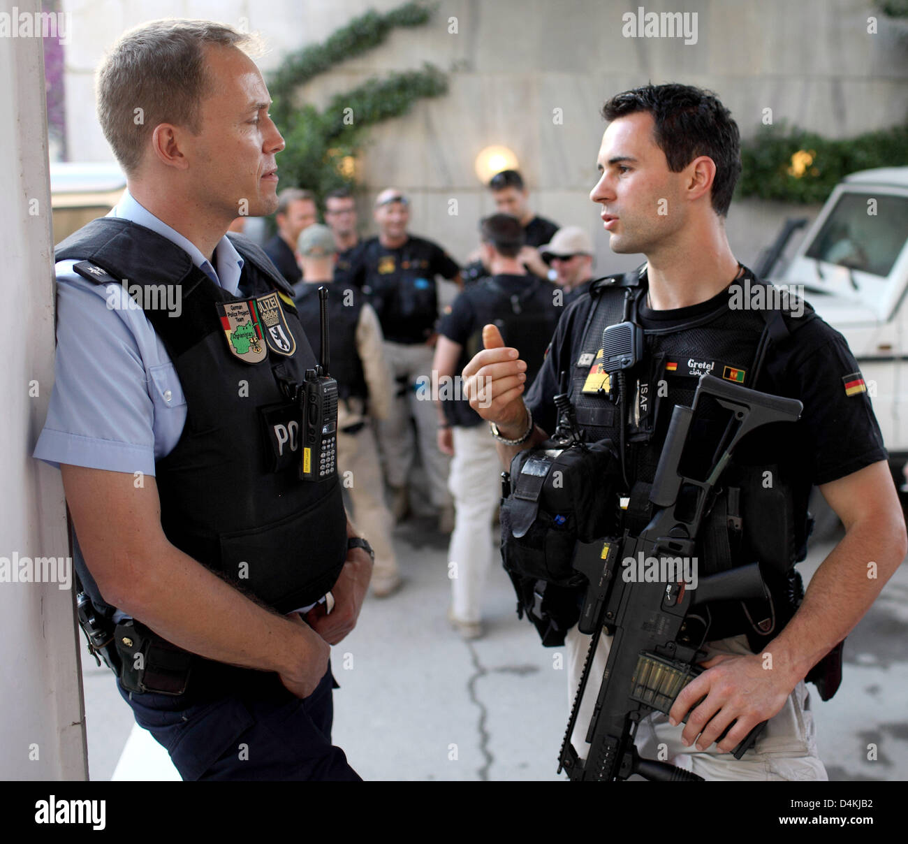 Security guards of the German Embassy talk in Kabul, Afghanistan, 29 ...