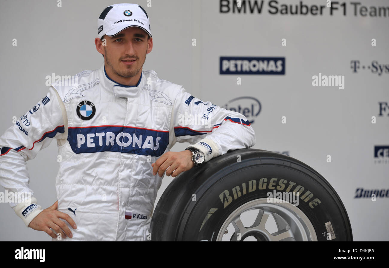 Polish Formula One driver Robert Kubica of BMW Sauber poses during a ...