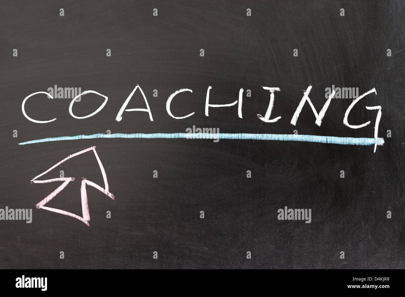 Coaching word and mouse pointer drawn on chalkboard Stock Photo - Alamy