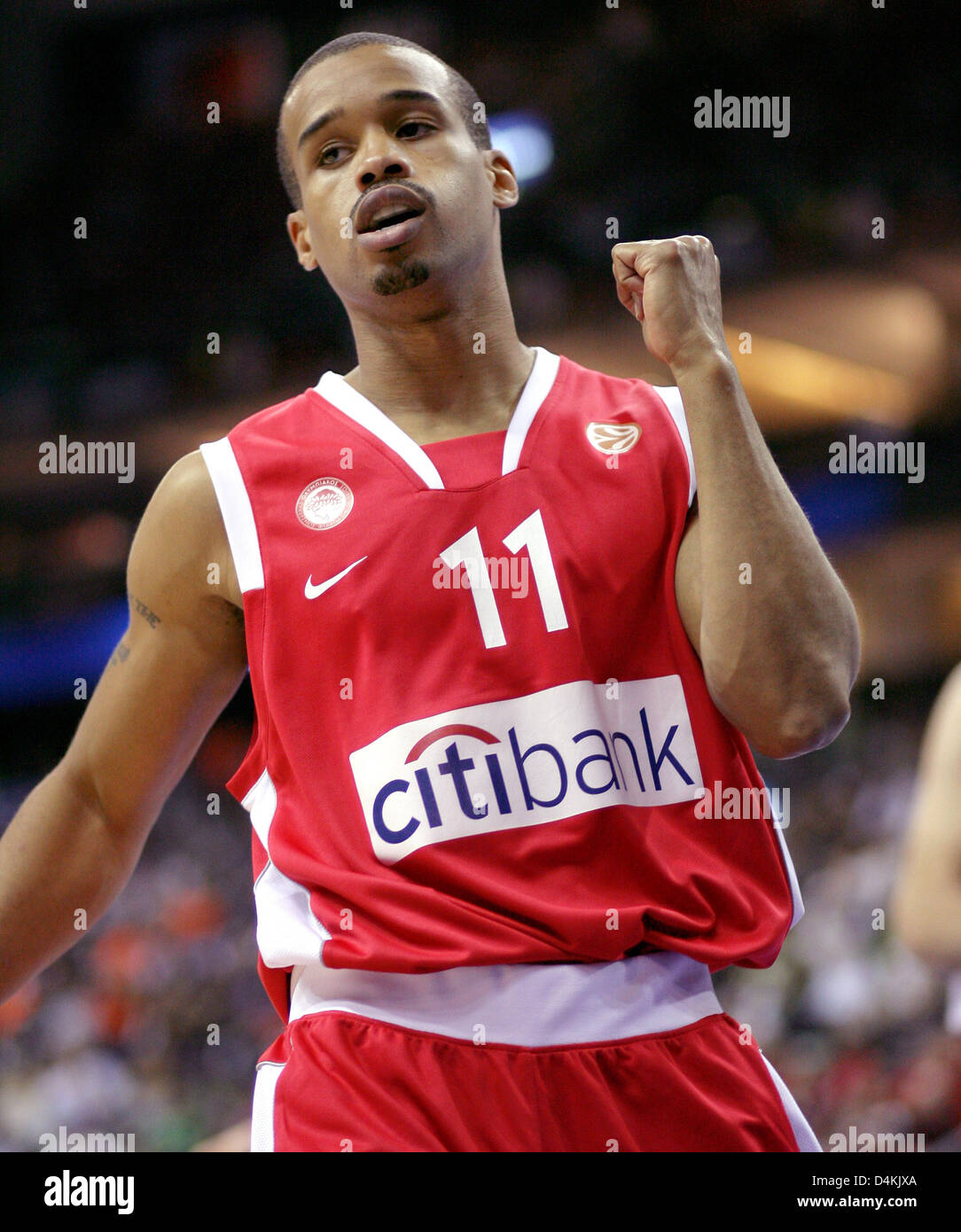 Lynn Greer of Olympiacos Piraeus cheers during the Basketball ...