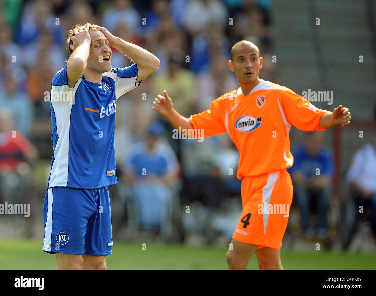 Karlsruhe?s Alexander Iashvili (L) gestures next to Cottbus? Stanislav ...