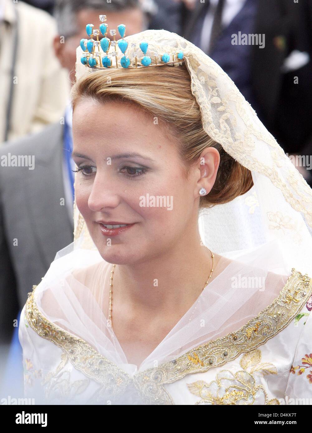 The bride, Philomena de Tornos, arrives at her church wedding with ...