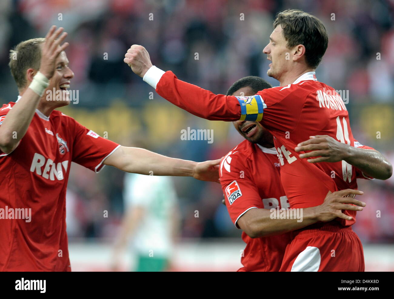 Cologne?s Milivoje Novakovic (R) celebrates his 1-0 score with ...
