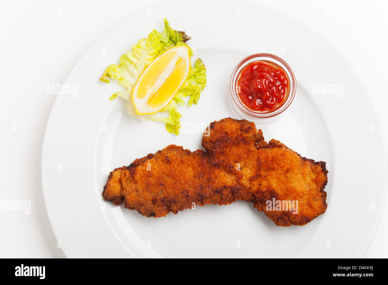 wiener schnitzel in the shape of austria Stock Photo - Alamy