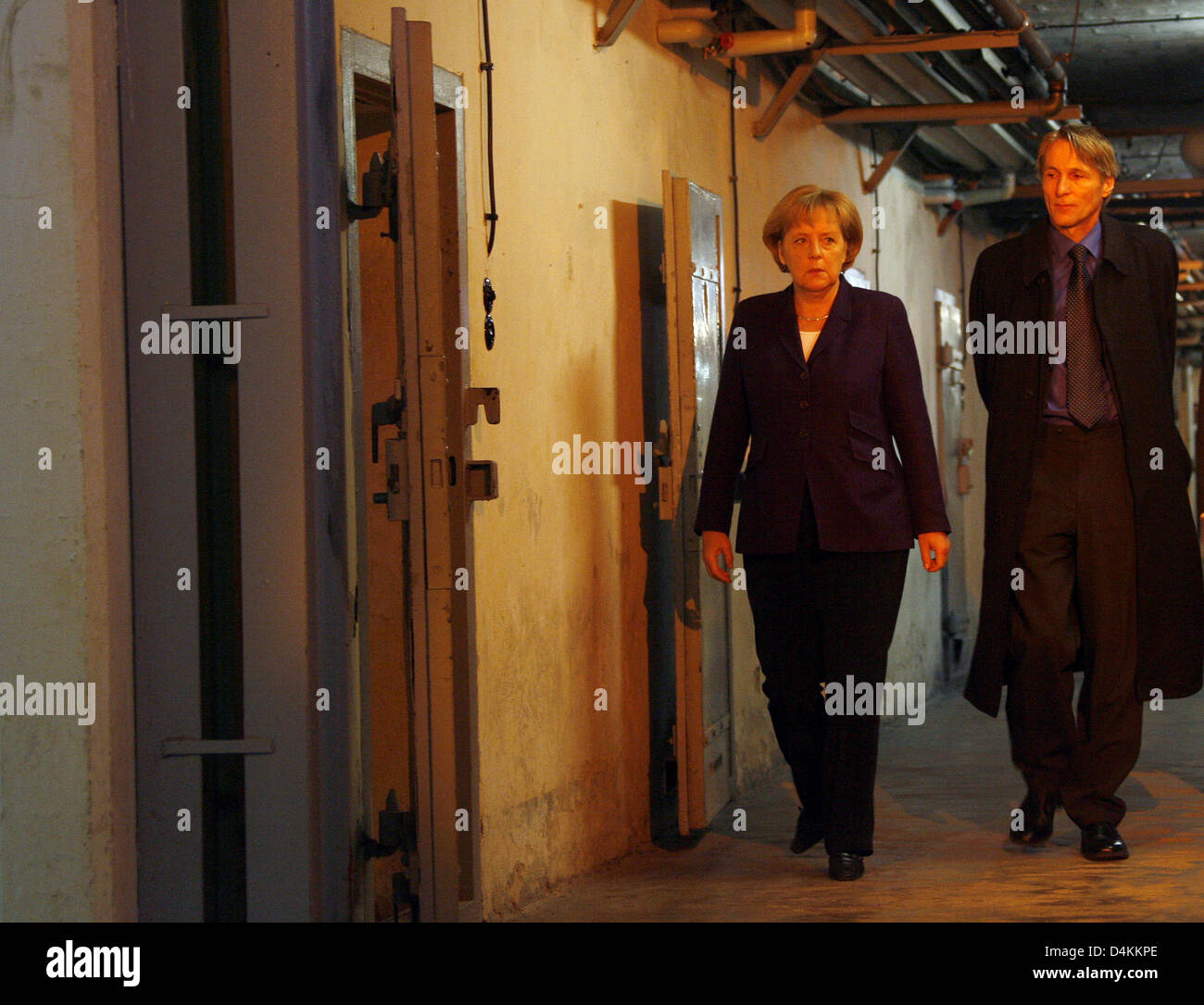 German Chancellor Angela Merkel (L) visits former GDR?s state security ...