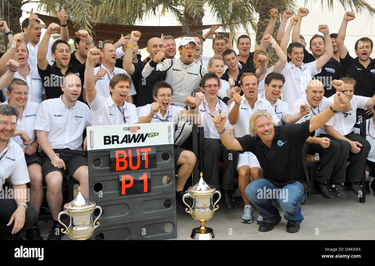 The team of Brawn GP with British driver Jenson Button (C), team ...