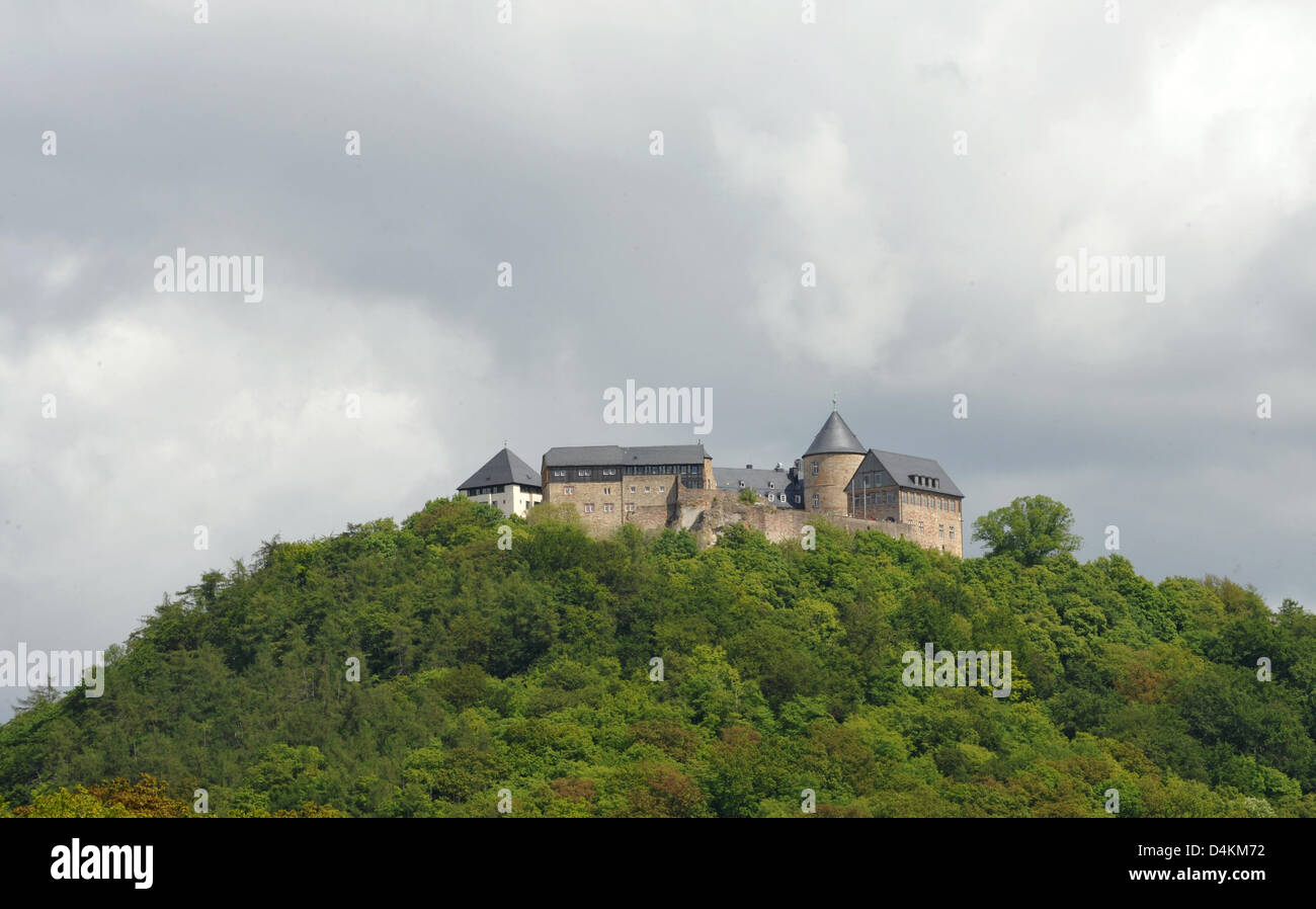 The picture shows Castle Waldeck which is built on a hill at the ...