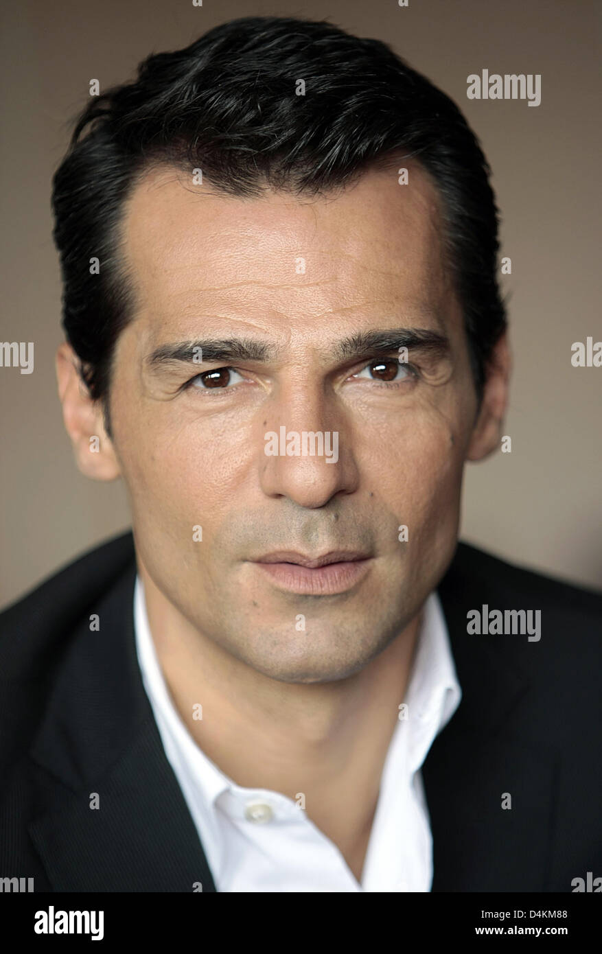 Actor Erol Sander as Mehmet Oezakin poses at a photocall for the ...