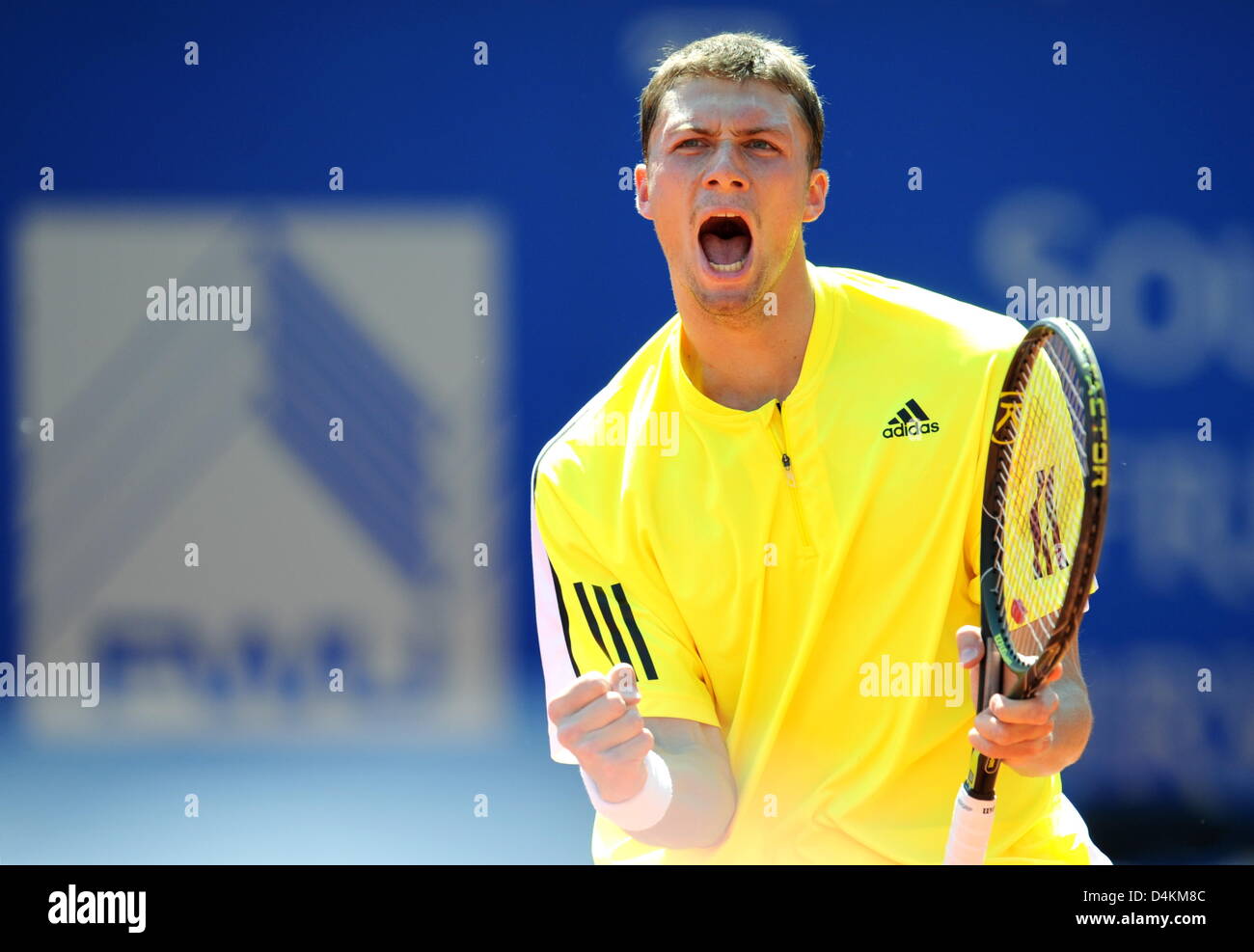 Germany?s Daniel Brands cheers after winning the second round match ...