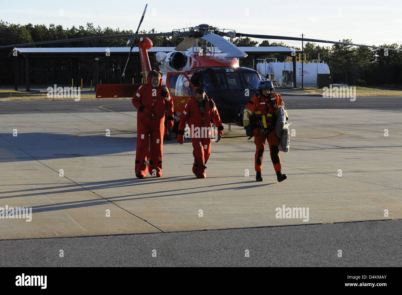 Coast Guard personnel escorted rescued mariners to safety, providing ...