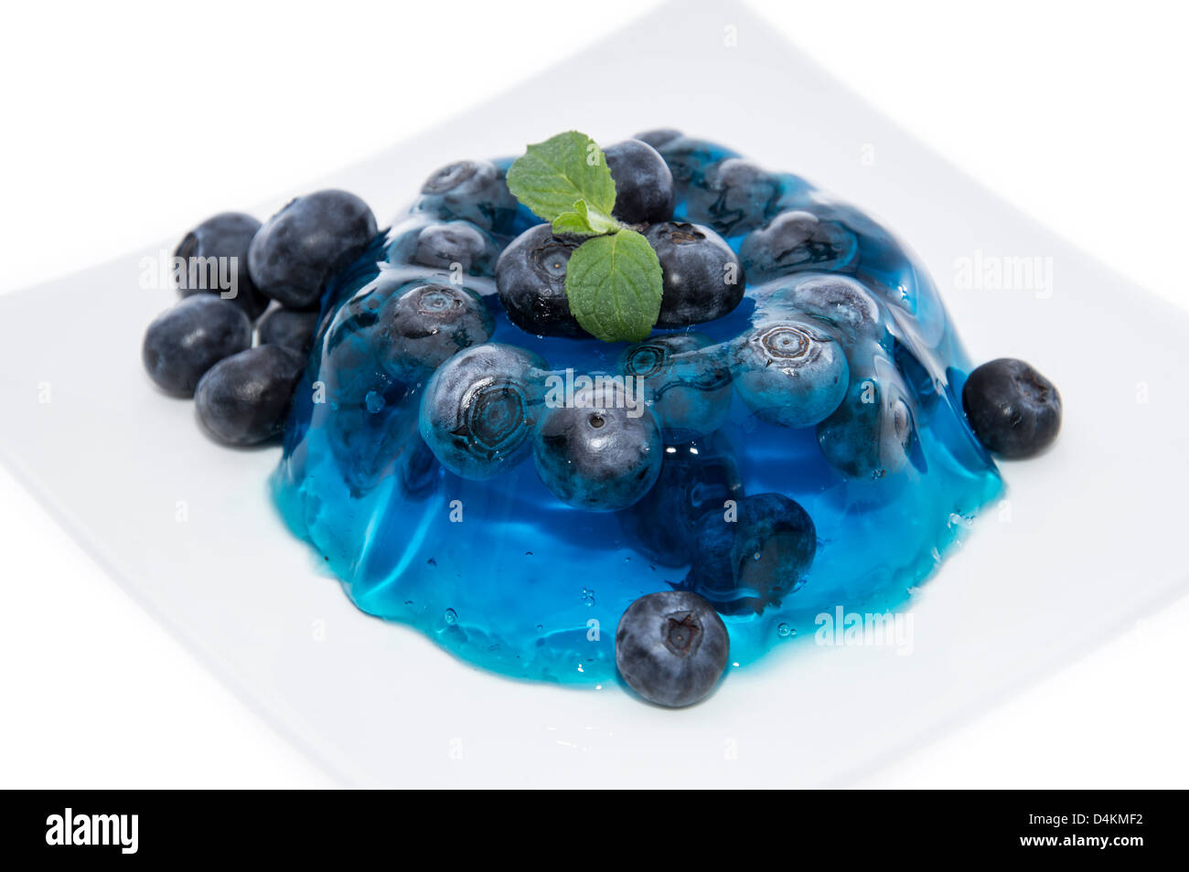 Portion of Blueberry Jello isolated on white background Stock Photo - Alamy