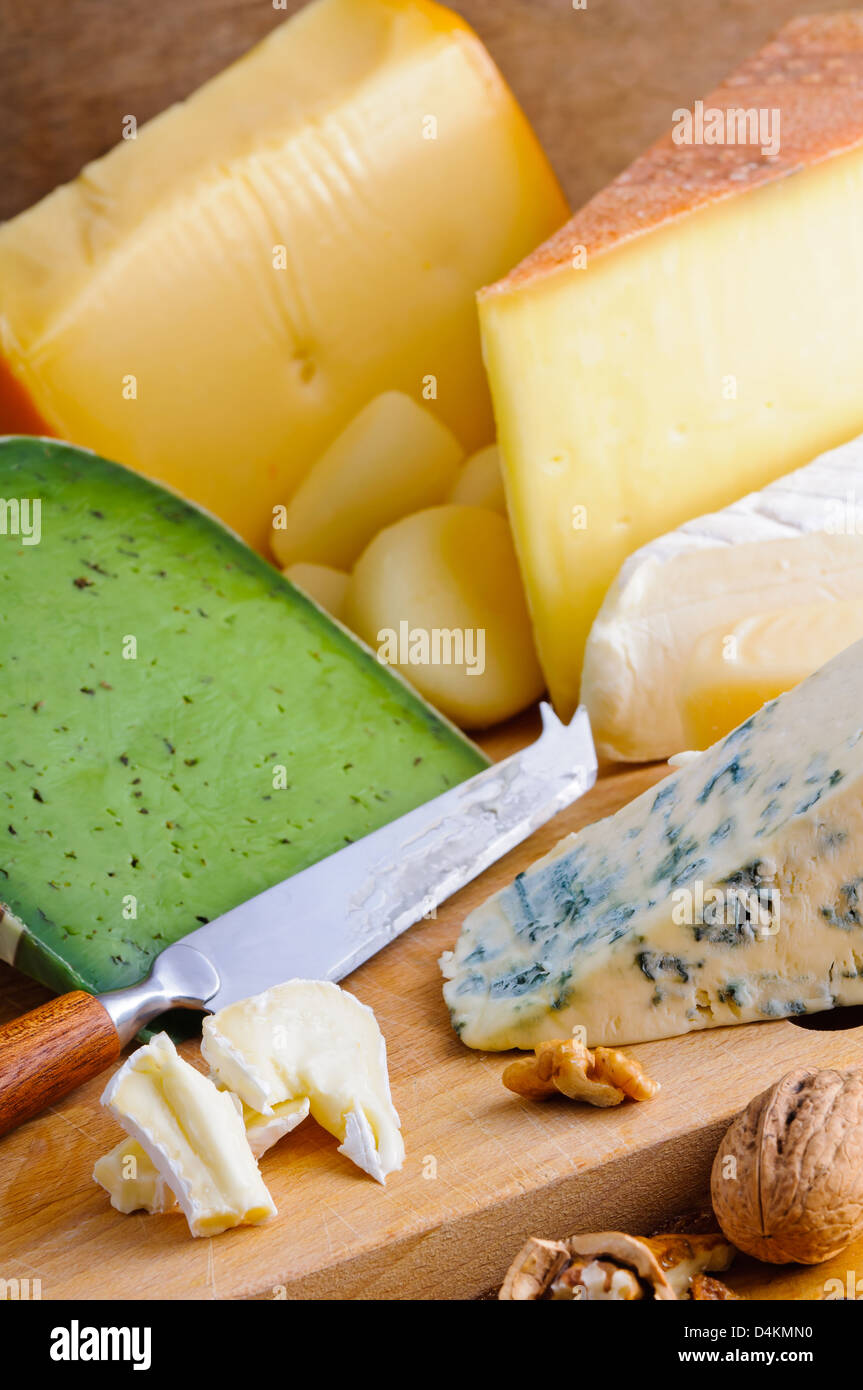 Healthy cheese snack on wooden board Stock Photo - Alamy