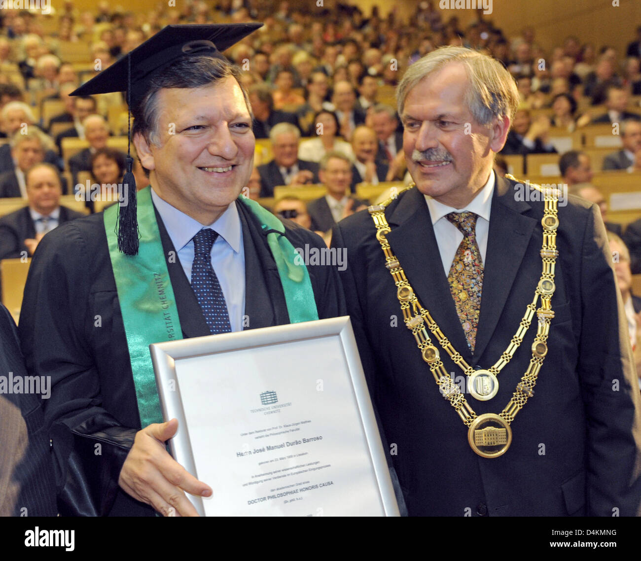 President of the EU Commission Jose Manuel Barroso (L) is awarded ...