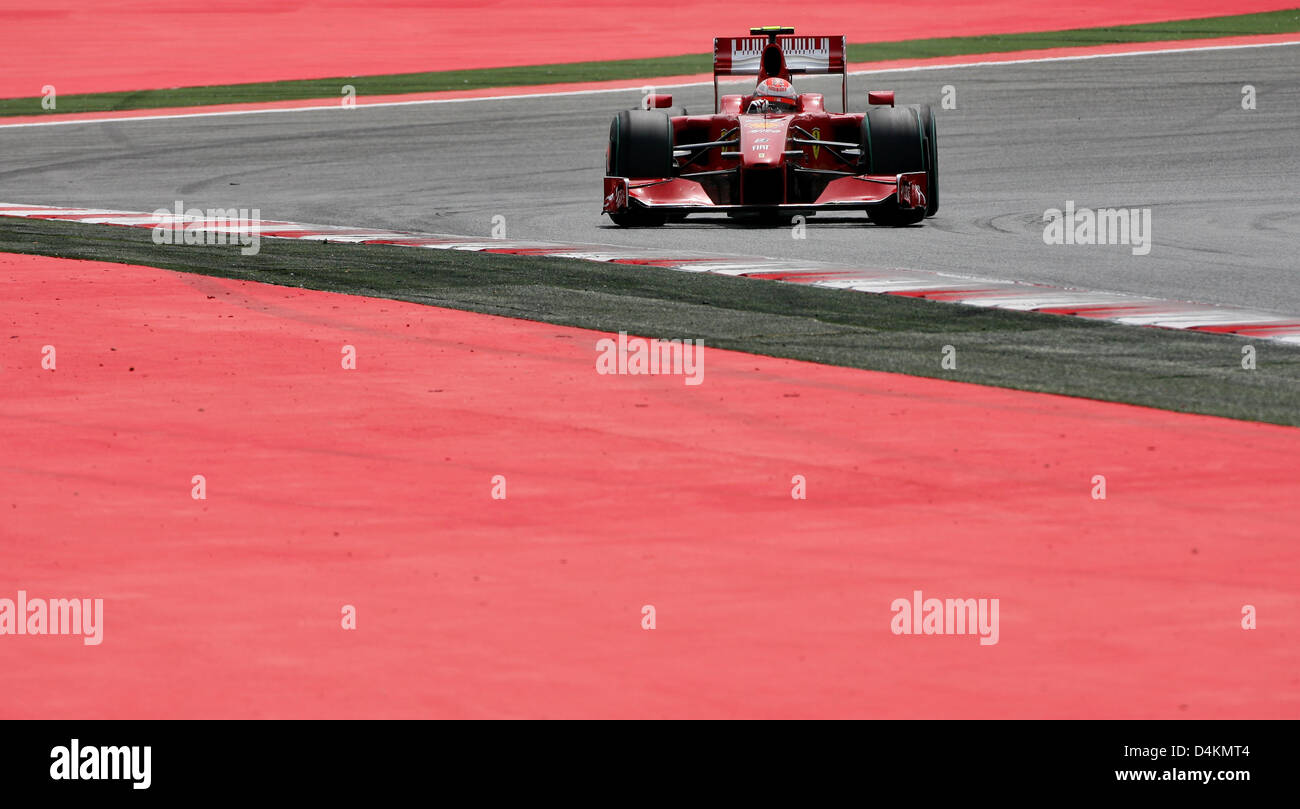 Finnish Formula One driver Kimi Raikkonen of Scuderia Ferrari exits a ...