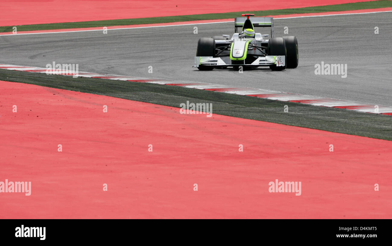 British Formula One driver Jenson Button of Brawn GP exits a turn ...