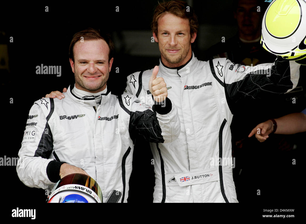 British Formula One driver Jenson Button of Brawn GP (L) and German ...