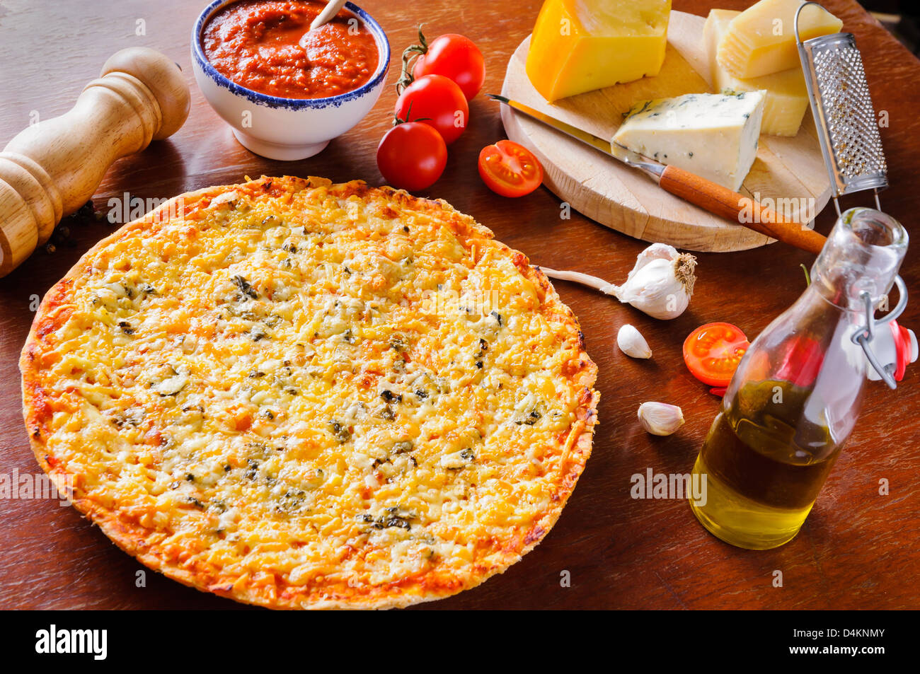 Traditional italian cheese pizza with ingredients Stock Photo - Alamy