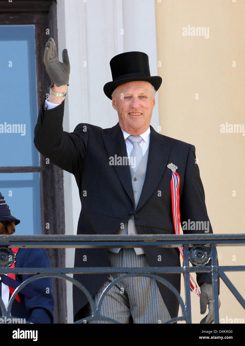 King Harald V of Norway waves on the balcony of the Royal Palace during ...