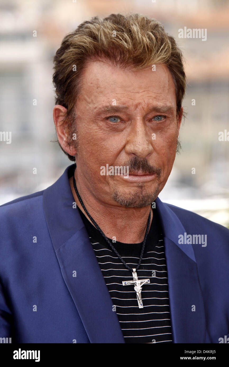 French actor Johnny Halliday poses during a photo call on the film ...