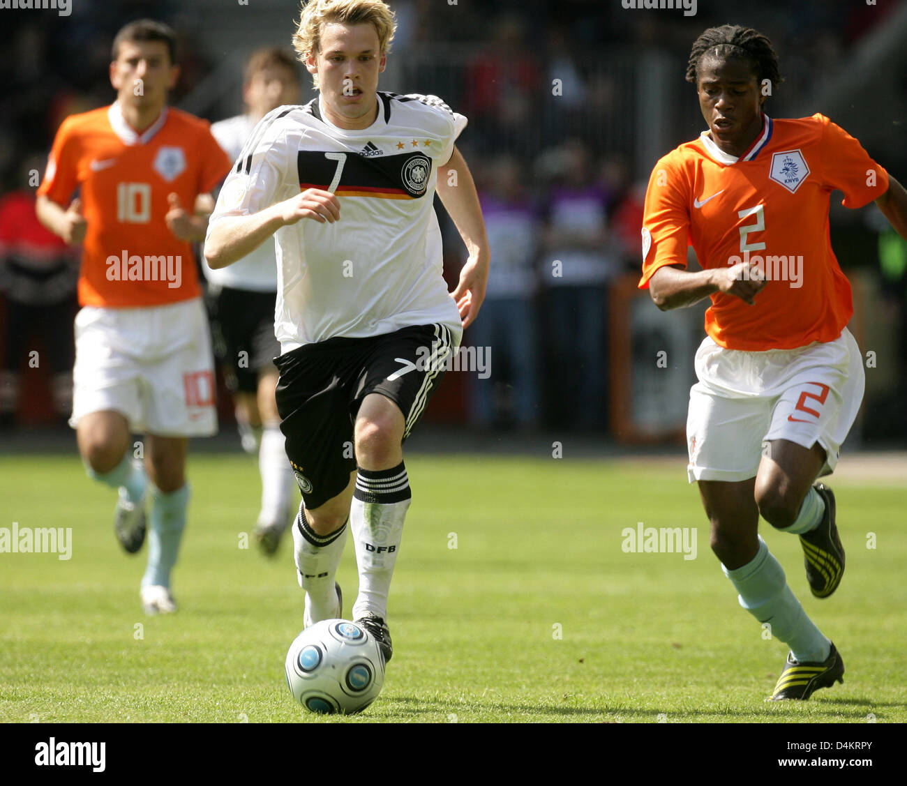 German Christopher Buchtmann (L) fights for the ball with Dutch Ruben ...