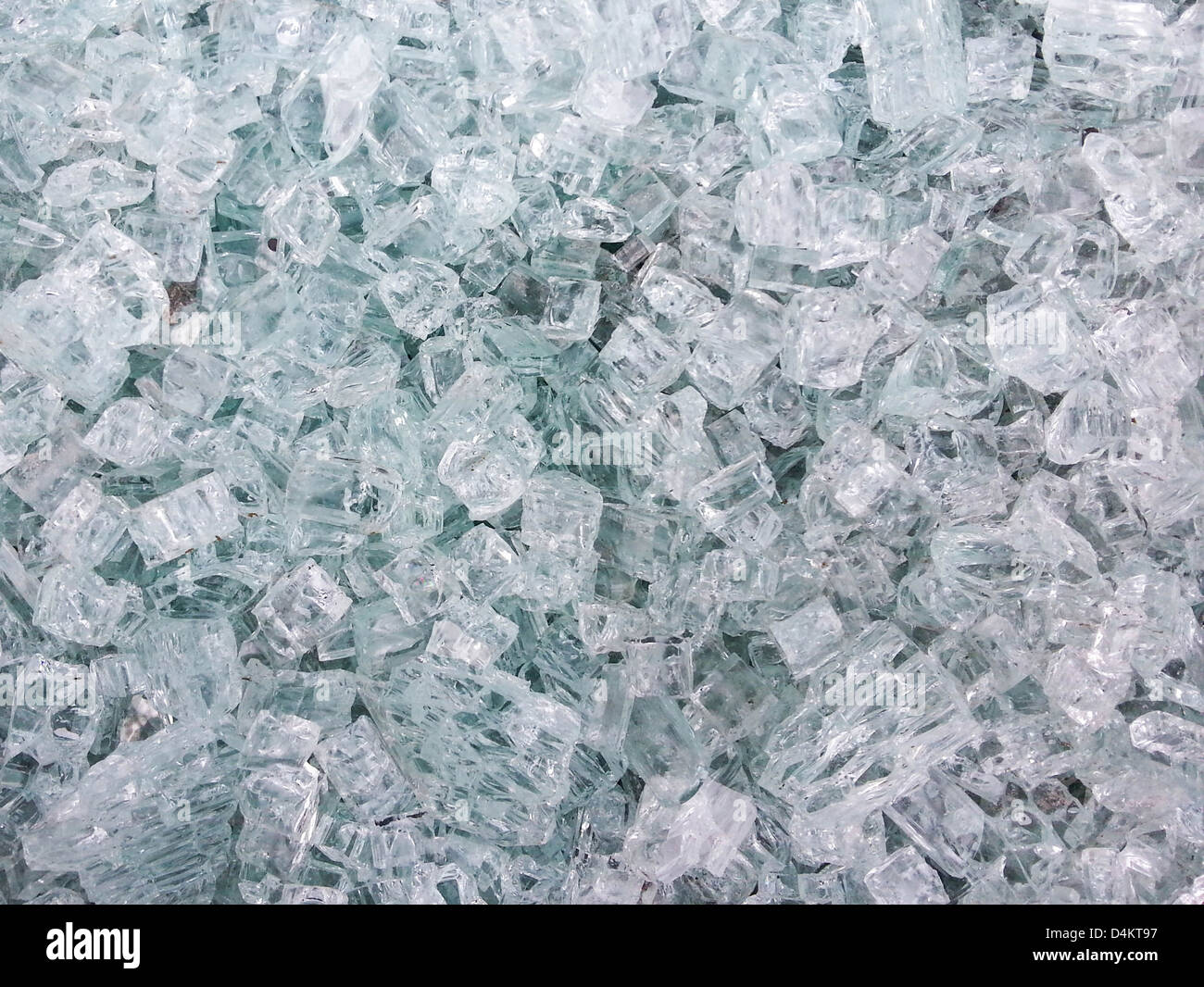 Broken glass in pieces background Stock Photo - Alamy