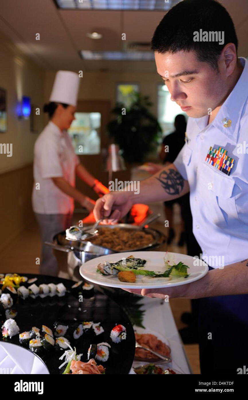 A group of U.S. Coast Guard cooks graduates from a prestigious culinary ...