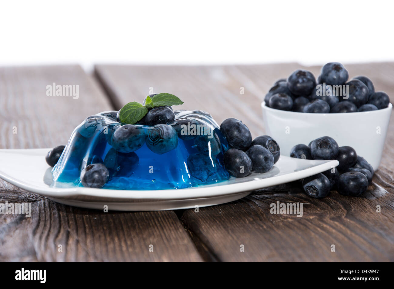 Blueberry Jello on a table isolated on white Stock Photo - Alamy