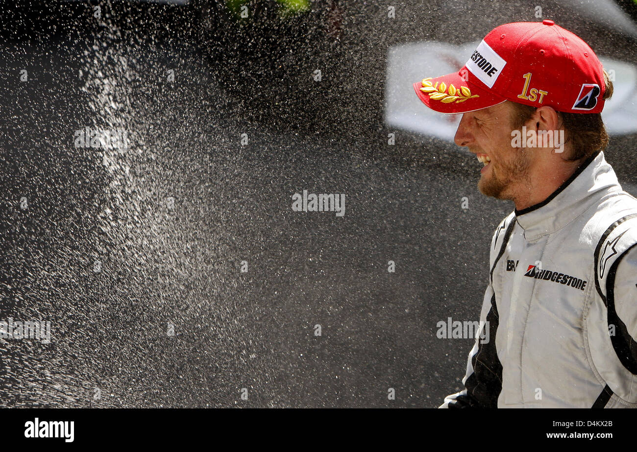 British Formula One driver Jenson Button of Brawn GP celebrates on the ...