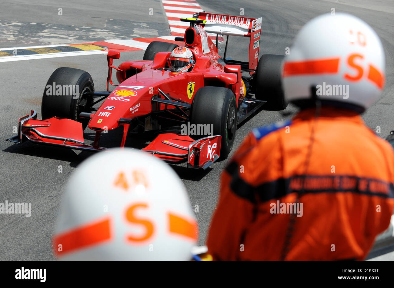 Finnish Formula One driver Kimi Raikkonen of Ferrari steers his car ...