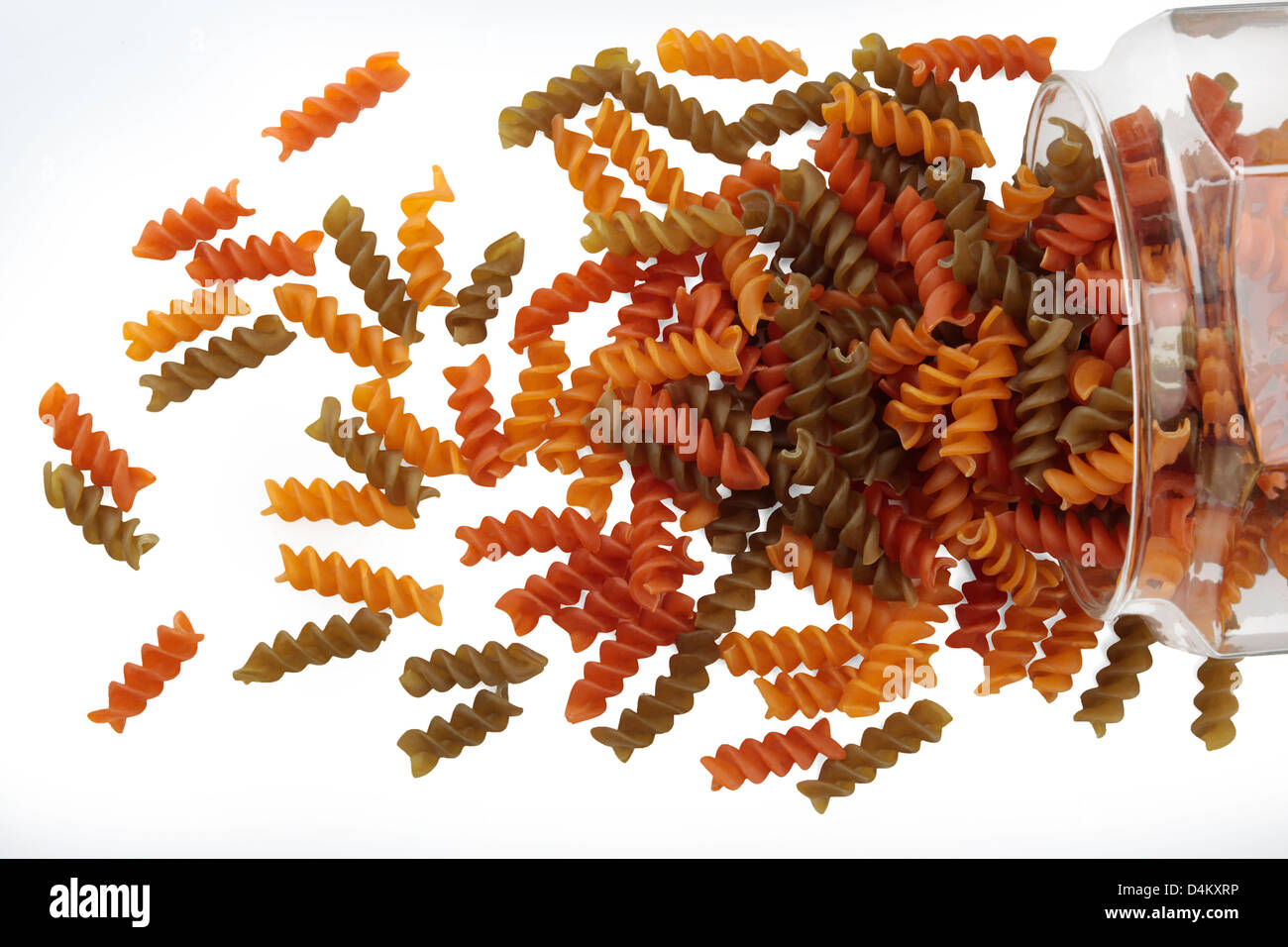 Dried pasta in a glass jar on white background Stock Photo - Alamy