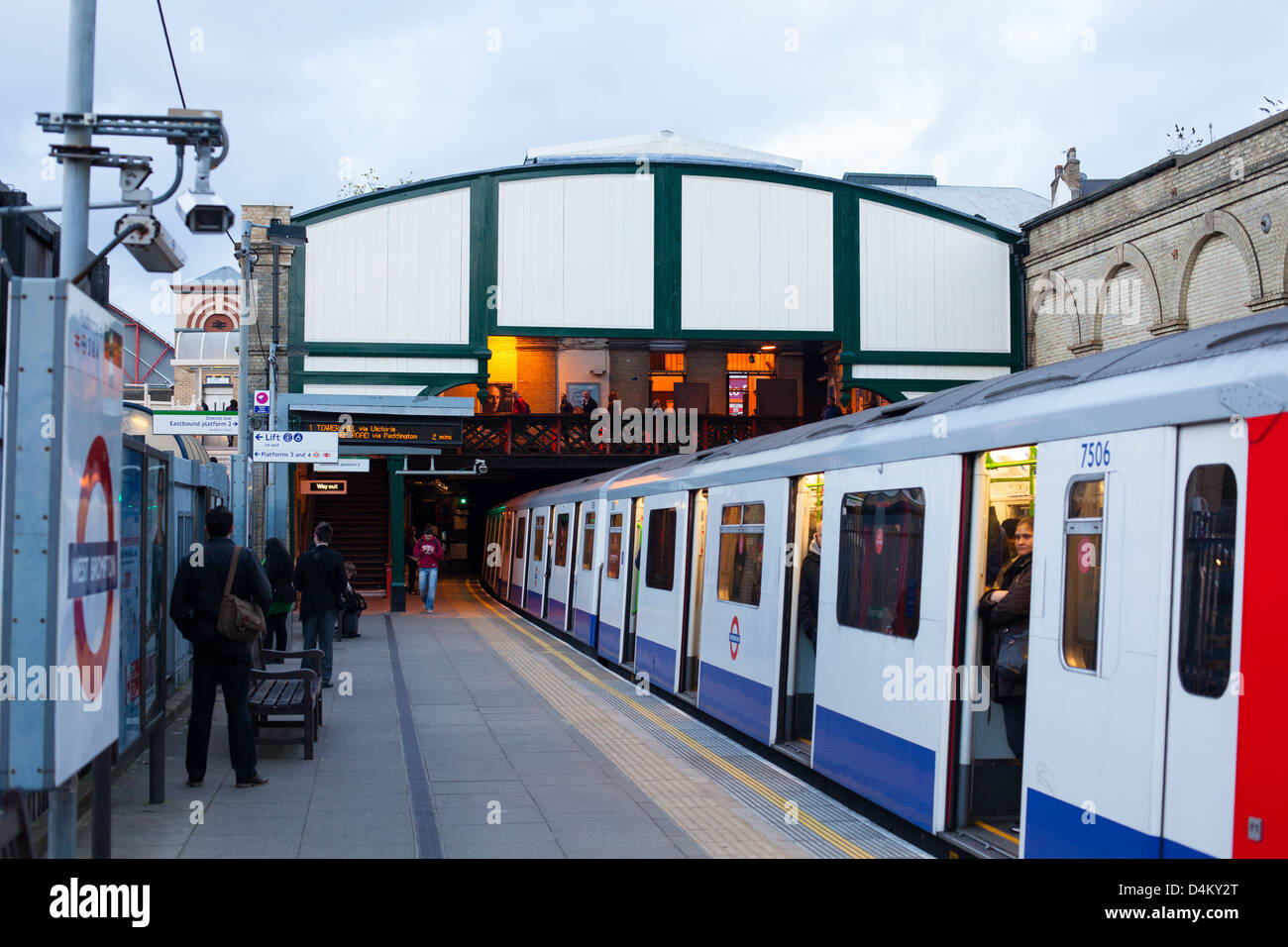 London tube train standing at station West Brompton District Line Stock ...