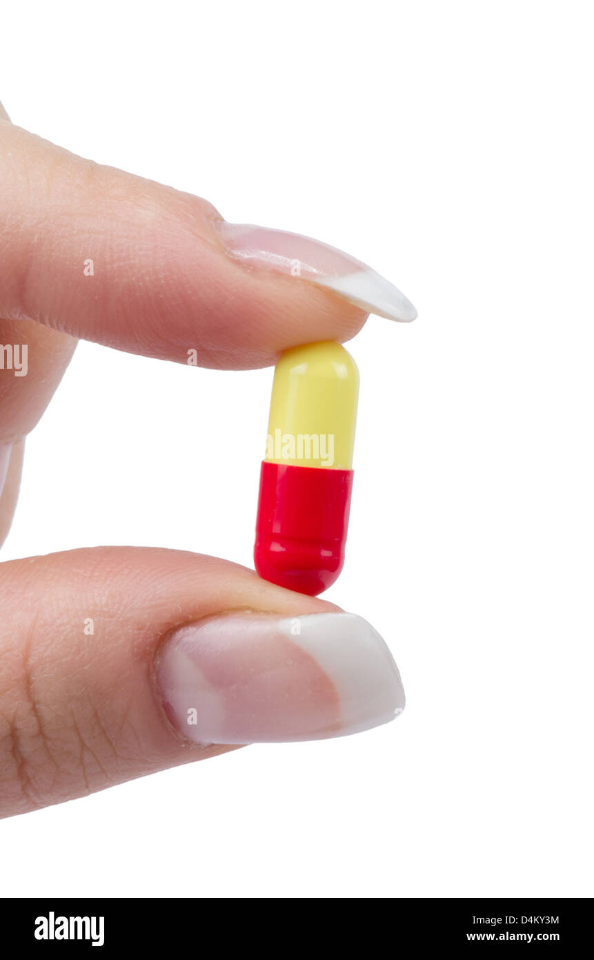 Finger holds pill hi-res stock photography and images - Alamy