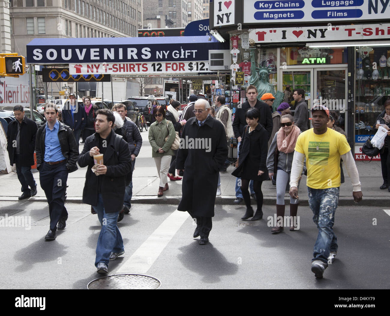 Pedestrians crossing 32nd Street along 5th Avenue in new York City. 5th ...