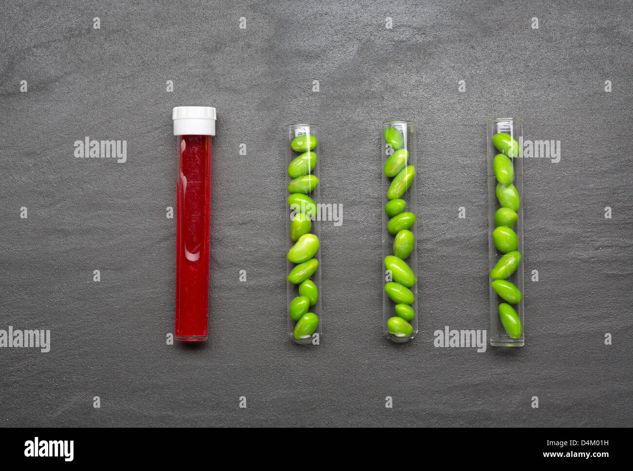 Beans and liquid in test tubes Stock Photo - Alamy